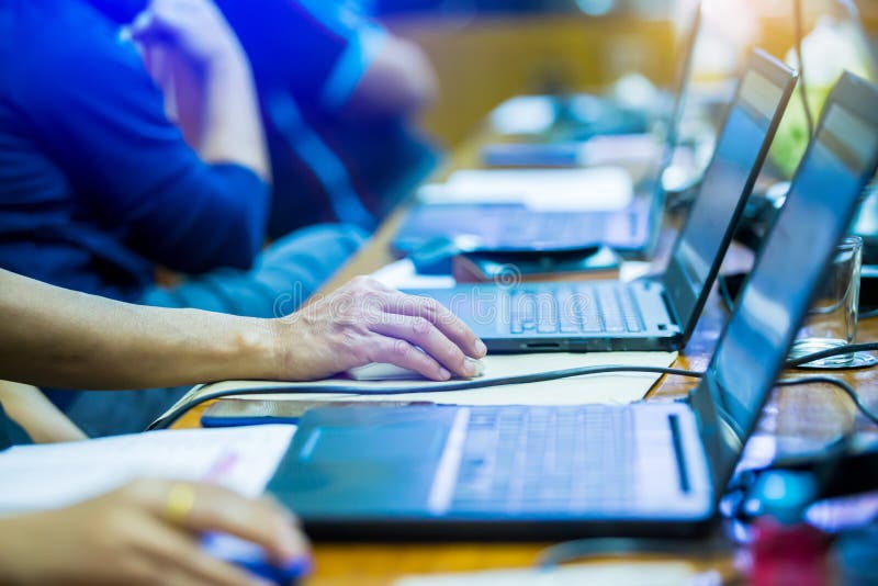 Selective and Soft Focus To Hand Hold a Mouse with Black Computer ...