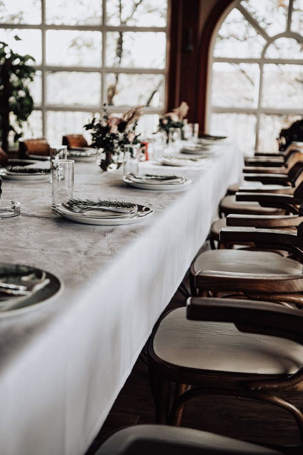 Selective Vertical Shot of a Table Set in a Restaurant Decorated for a ...
