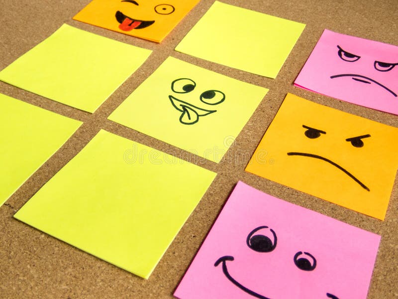 Self Adhesive Office Notes with Different Face Expression on Cork Board ...
