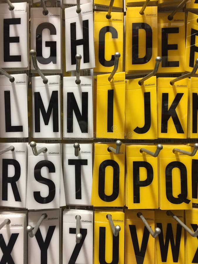 Vinyl Capital Letters Hanging in Store. Stock Image - Image of sign ...