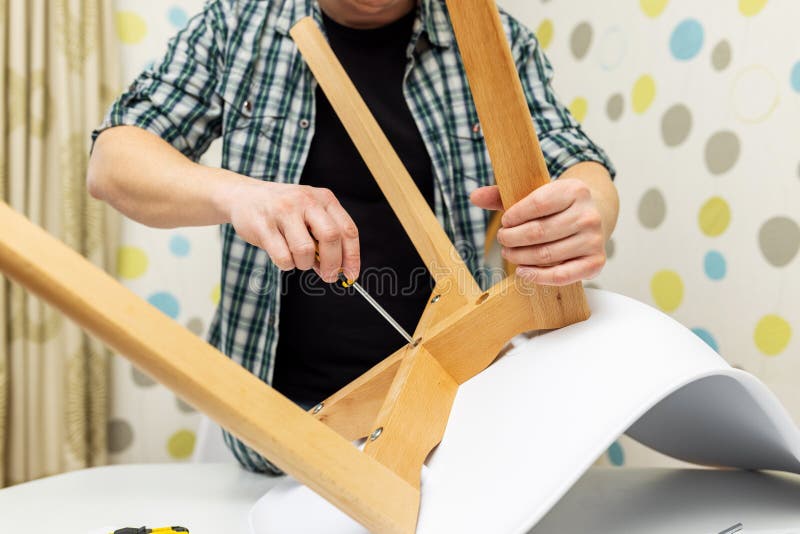 Self Assembly Furniture Concept The Young Man Himself Assembling