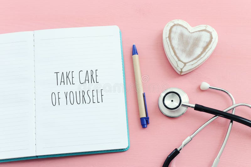 Self Care Concept. Notebook with Text Over Pastel Pink Background Stock ...