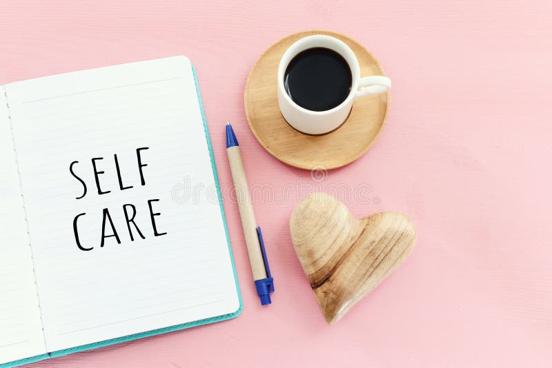 Self Care Concept. Notebook with Text Over Pink Background Stock Photo ...