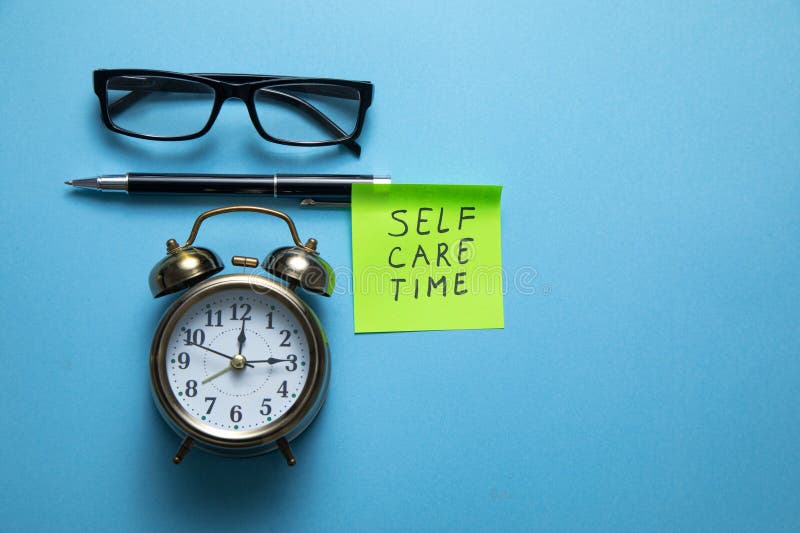 Self Care Time on Sticky Note with a Clock and Business Objects Stock ...