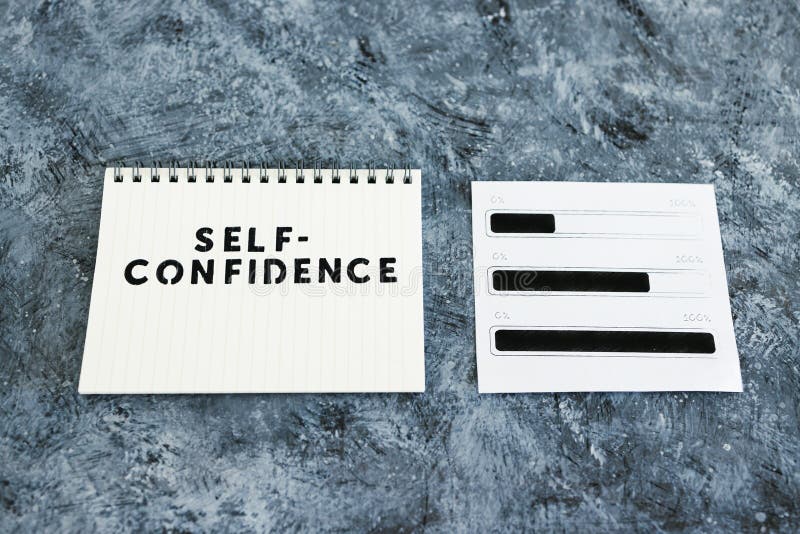Self-confidence Text on Notepad Next To Group of Progress Bars Loading ...