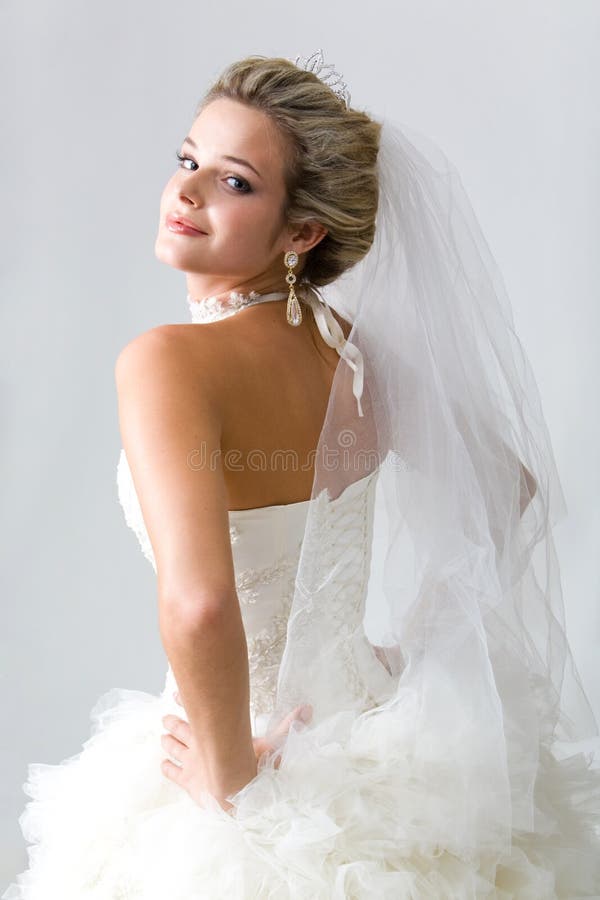 Smiling Bride Setting the Garter Stock Photo - Image of fianc ...