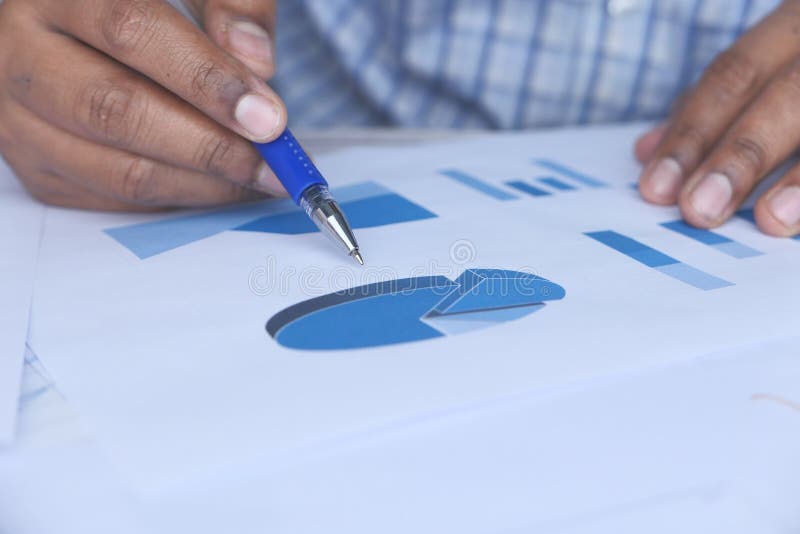 Businessman Analyzing Financial Chart on Paper Stock Image - Image of ...