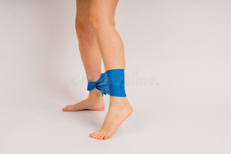 Self Determined Bodybuilder Does Exercises with Rubber Band, Works on ...