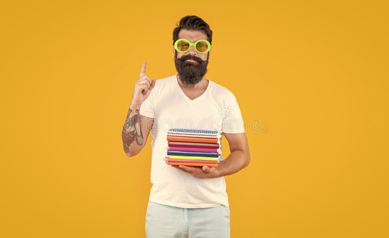 Self Education of Winking Man Student. Man Student with Book Stack for ...