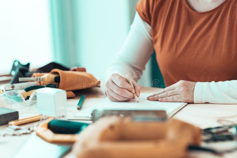 Self Employed Female Carpenter Writing Project Notes Stock Photo ...