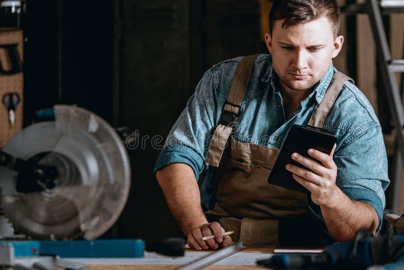 Self-employed Machine Constructor Calculating Costs Stock Photo - Image ...