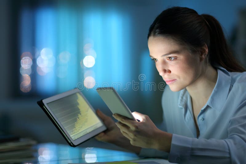 Self Employed Working with Multiple Devices in the Night Stock Photo ...