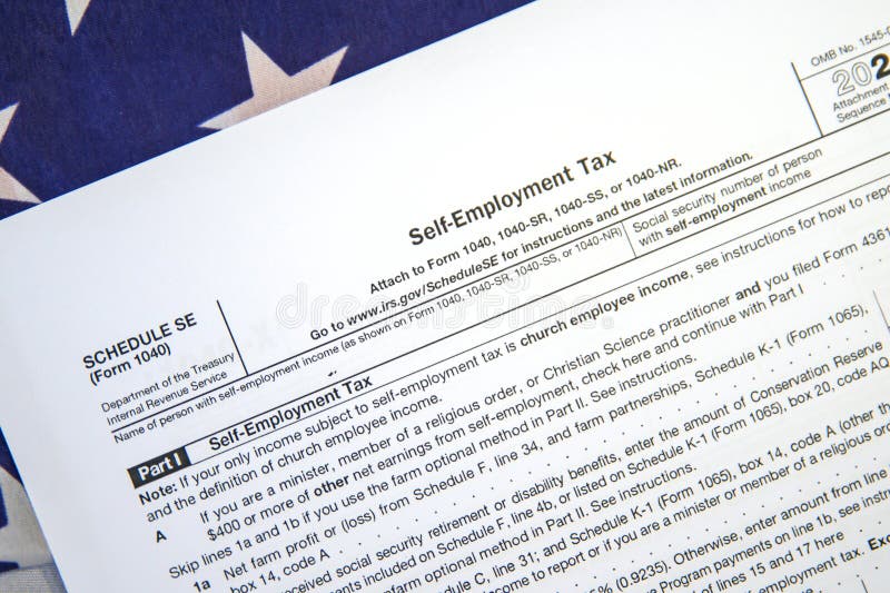 Self Employment Tax Form on the American Flag Backdrop. 1040 for Self ...
