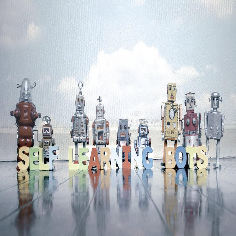 SELF LEARNING BOTS Wooden Letters and Retro Robot Toys Stock Image ...