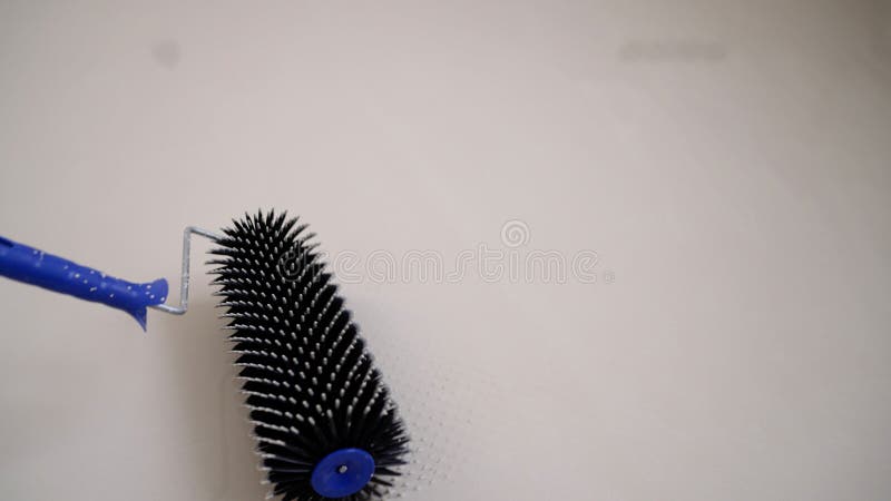 Self-leveling Epoxy with Needle Roller. Spiked Roller for Bulk Floor ...