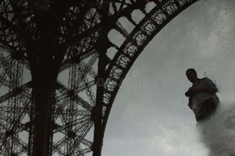 Self-portrait Under the Eiffel Tower Reflected in a Puddle Stock Image ...