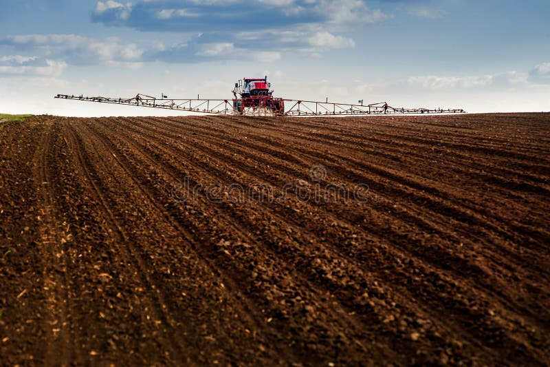 Self-propelled Sprayer at Arable Field Makes Fertilizers in Early ...