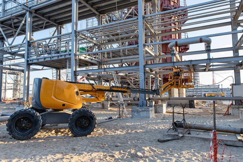 A Self-propelled Crawler Crane Stands on a Construction Site Stock ...