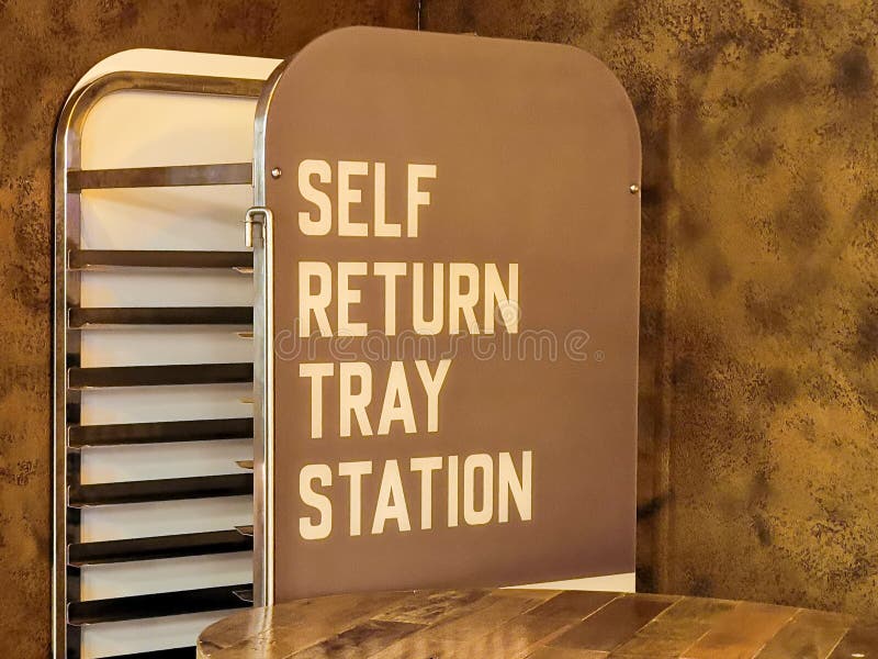 Self return tray station stock image. Image of station - 188527921