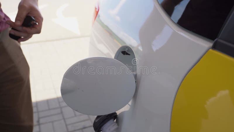 Self-service Gas Station. the Man Inserts the Gas Gun. Stock Footage ...