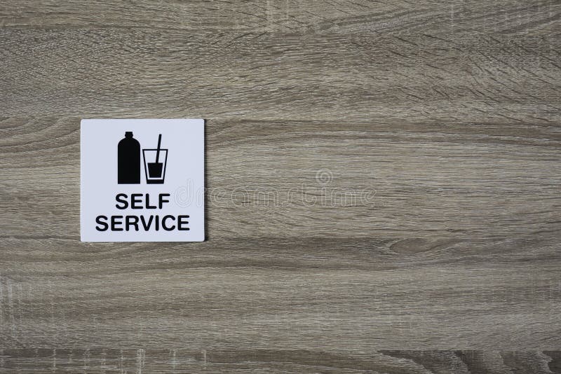 Self Service Sign on the Wooden Wall with Space for Adding Text on the ...