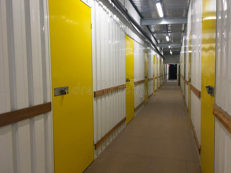 Corridor Full of Yellow Doors in Self Storage Building Stock Photo ...