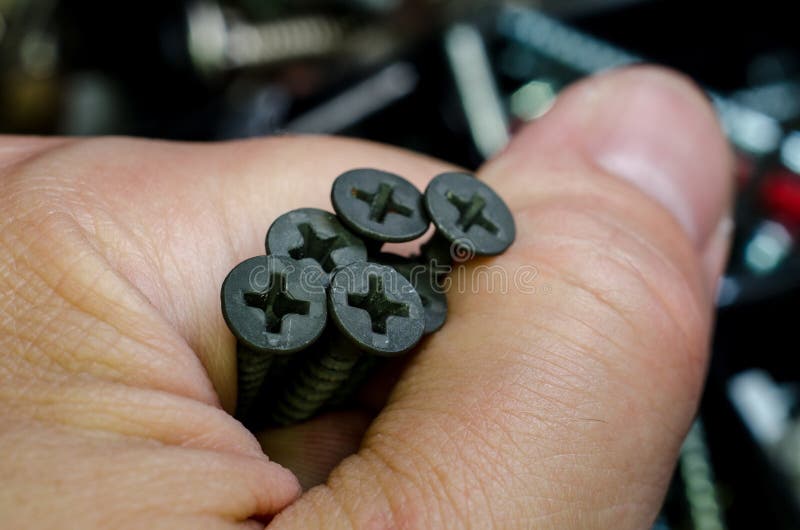 A self-tapping stock image. Image of hardware, holding - 140806421