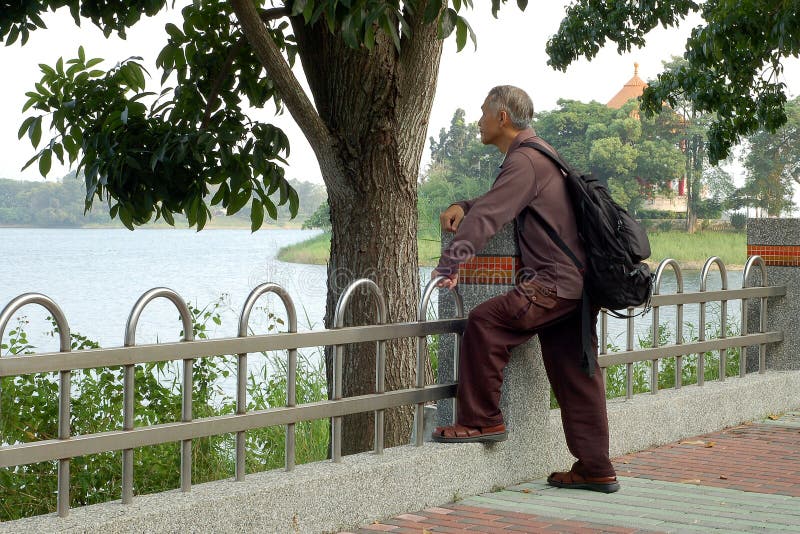 A Self-travel backpacker stock image. Image of fence - 21855021