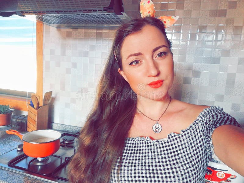 Selfie of a Girl in the Kitchen while Cooking Breakfast. Girl in Retro ...