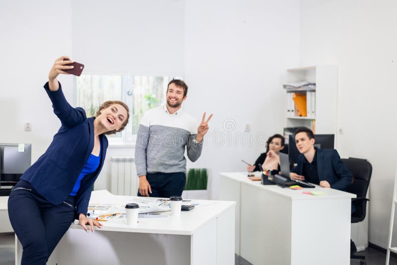 Selfie Time. Office Workers Taking Selfies at Work Stock Image - Image ...