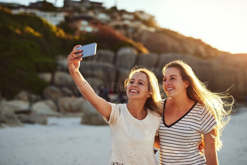 Selfies are a Must. Two Friends Taking a Selfie while Spending the Day ...