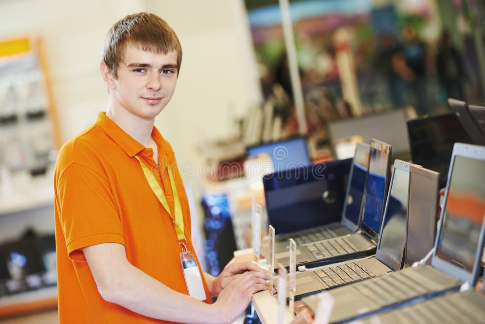 Seller at computer store stock image. Image of happy - 41006691
