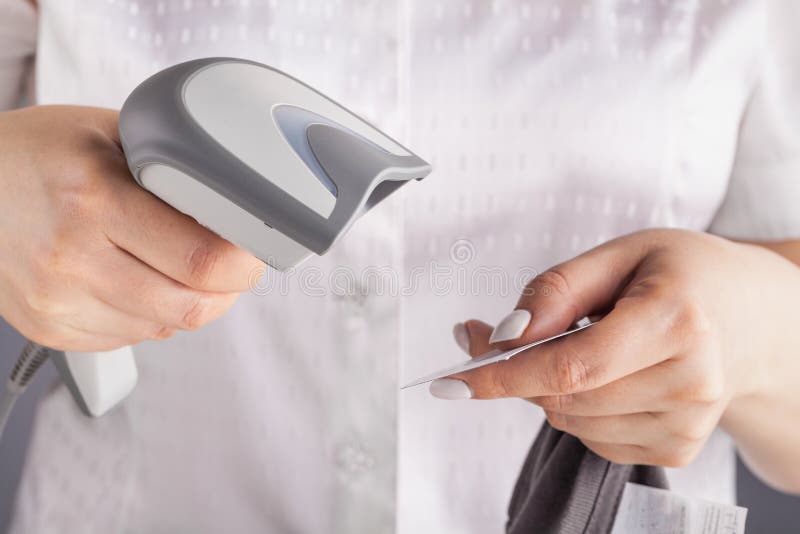 Seller Holding Barcode Scanner in a Hand Stock Photo - Image of code ...
