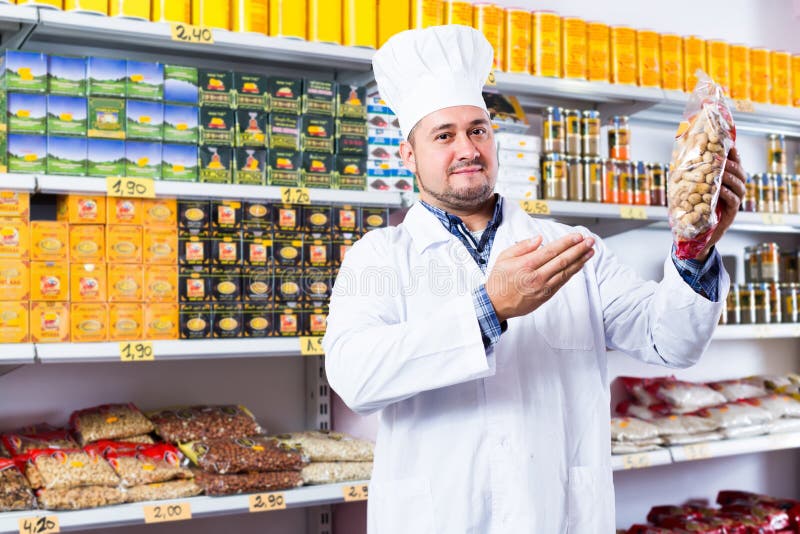 Seller in Local Grocery Store. Stock Image - Image of selling, salesman ...