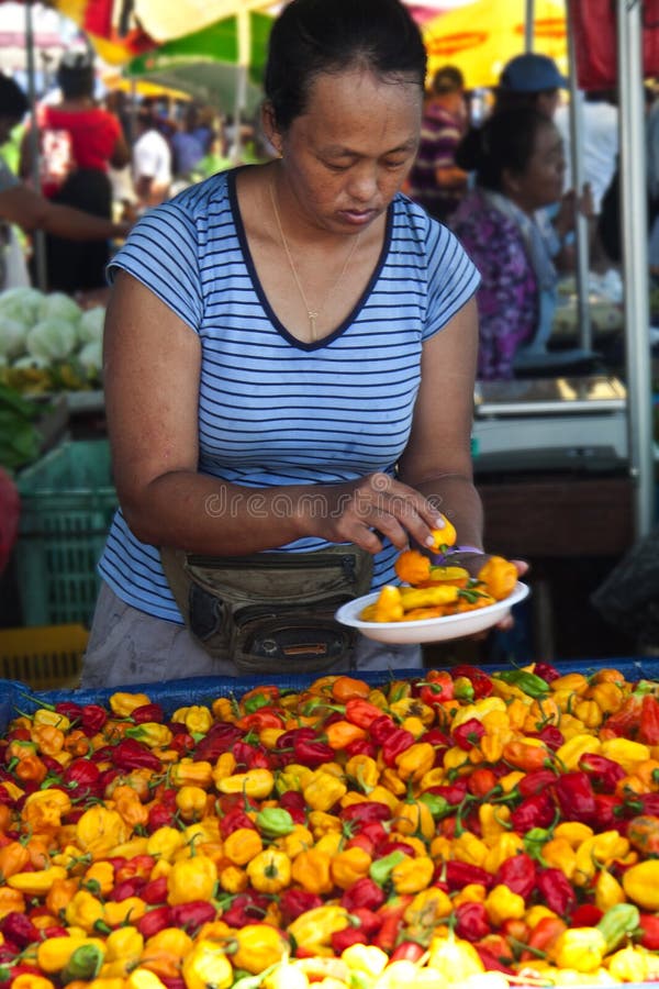 Seller on a market place editorial stock photo. Image of produce - 27262463