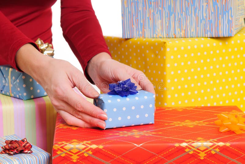 Seller offering a gift stock photo. Image of emotion - 27432102