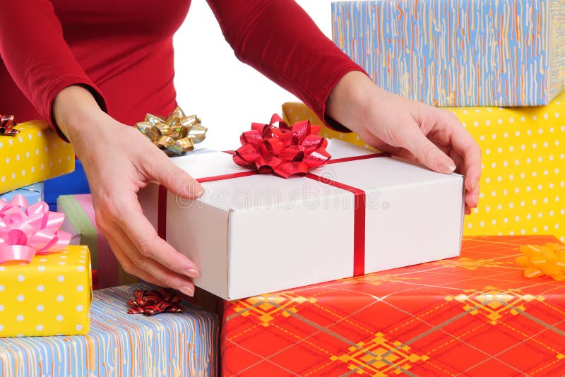 Seller offering a gift stock photo. Image of emotion - 27432102