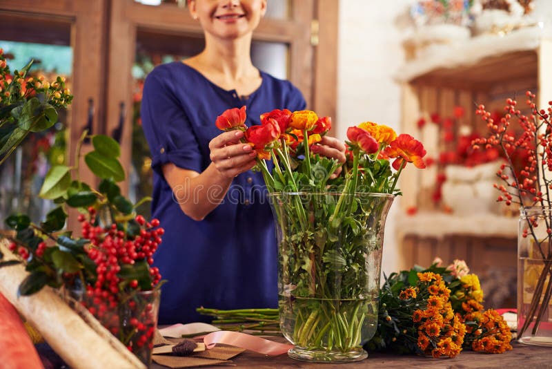 Selling flowers stock image. Image of person, occupation - 140202039