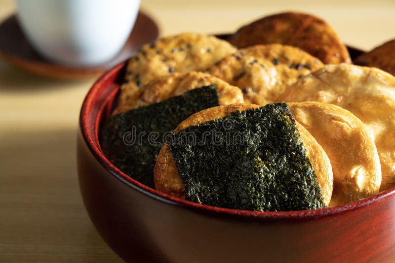Sembei and Green Tea on the Table. Sembei is a Japanese Snack Stock ...