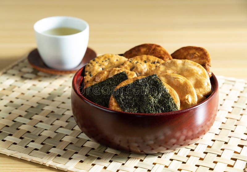 Sembei and Green Tea on the Table. Sembei is a Japanese Snack Stock ...