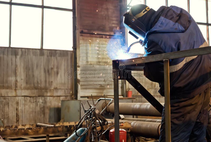Semi-automatic Welding of Metal Structures in the Shop Stock Photo ...
