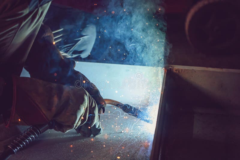 Semi-automatic Welding of Metal Structures in the Shop Stock Photo ...