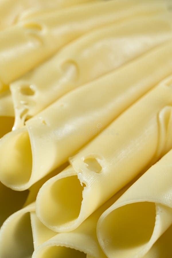 Semi-hard Cheese, Thin Slices, Rolled into Tubes. Stock Image - Image ...