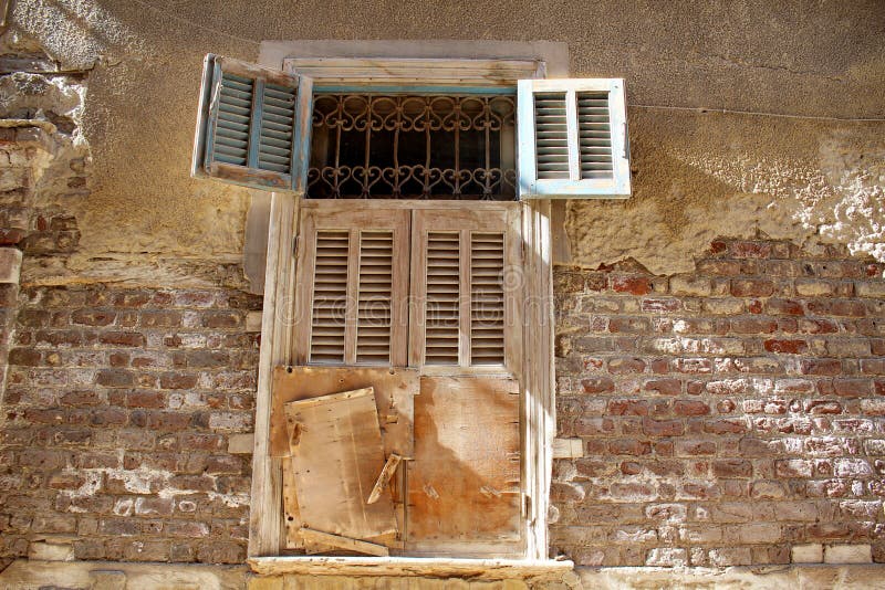 A Semi Open Shutter of an Old Wooden Window in Egypt Stock Image ...