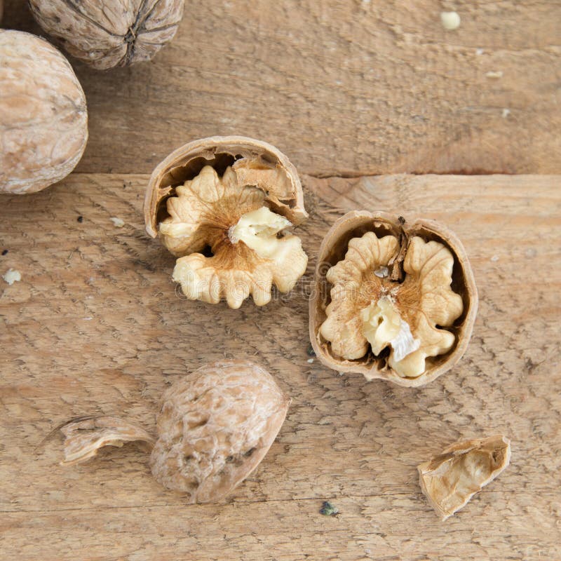 Semi-peeled Mature Walnut on a Table Made of Rough Boards Stock Photo ...