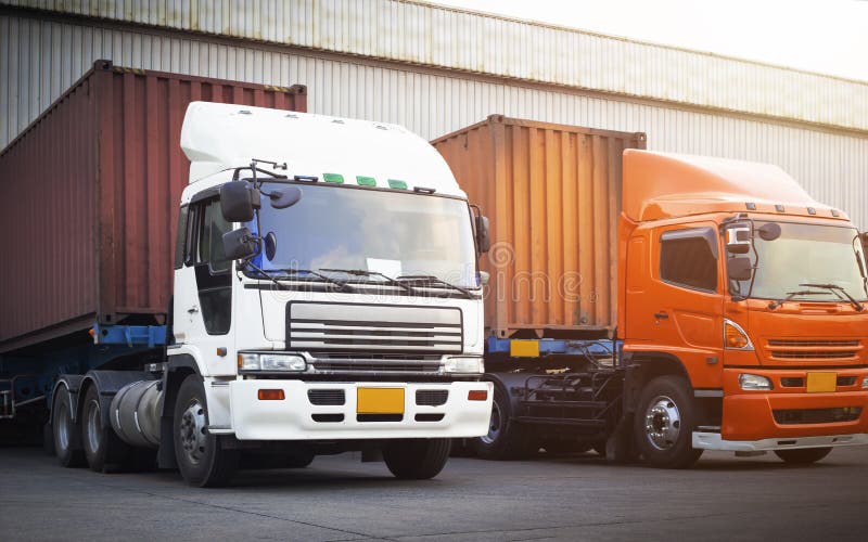 Semi Trailer Trucks Parked Loading at Dock Warehouse. Shipping Cargo ...