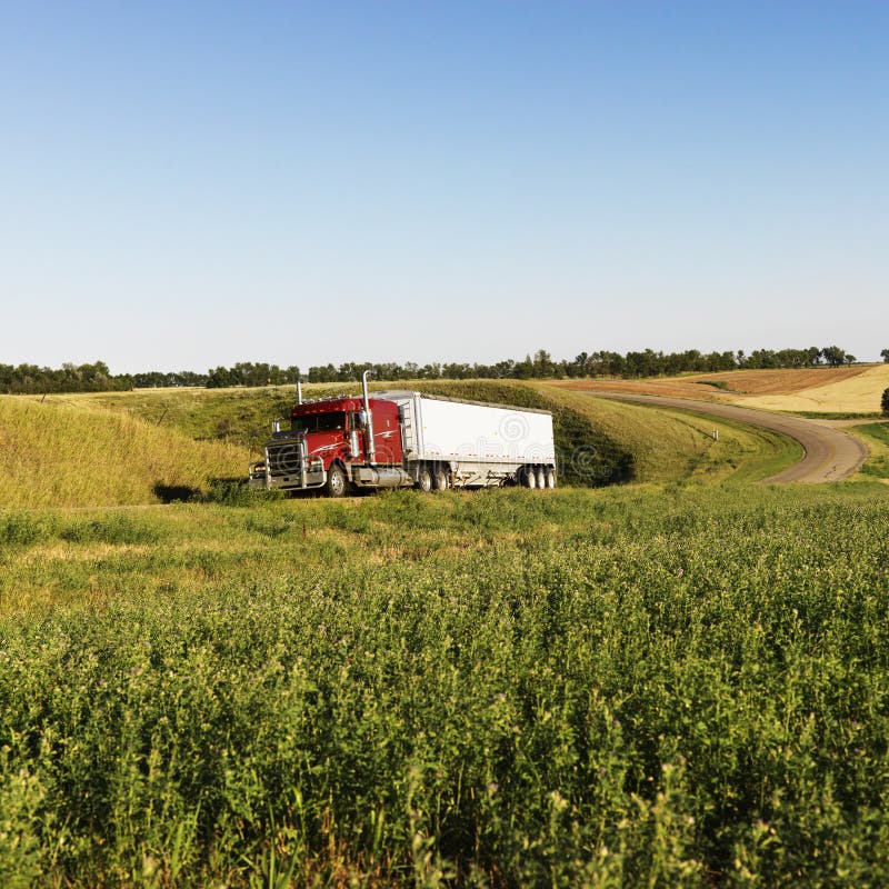 Semi truck on rural road. stock image. Image of square - 3422629