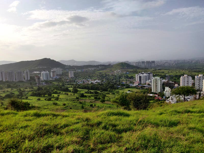 A Semi-urban Area with Grass on the Hill Stock Photo - Image of country ...