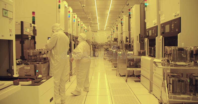Workers In Clean Room In A Semiconductors Manufacturing Facility Stock ...