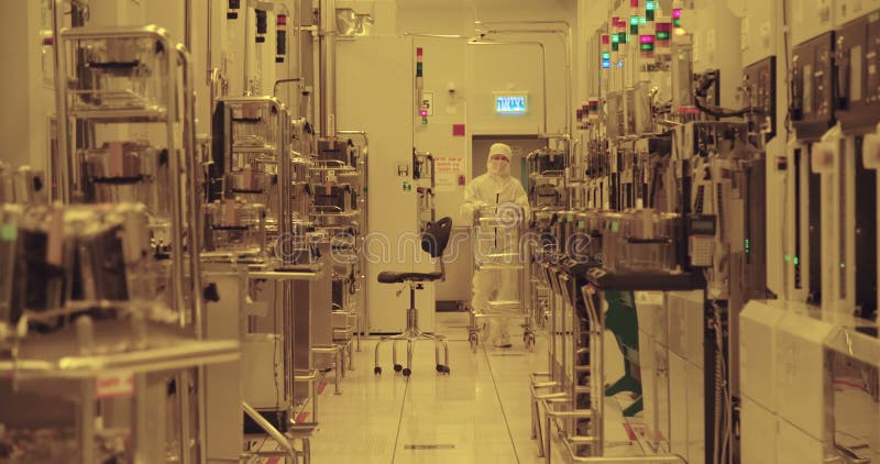 Workers In Clean Room In A Semiconductors Manufacturing Facility Stock ...